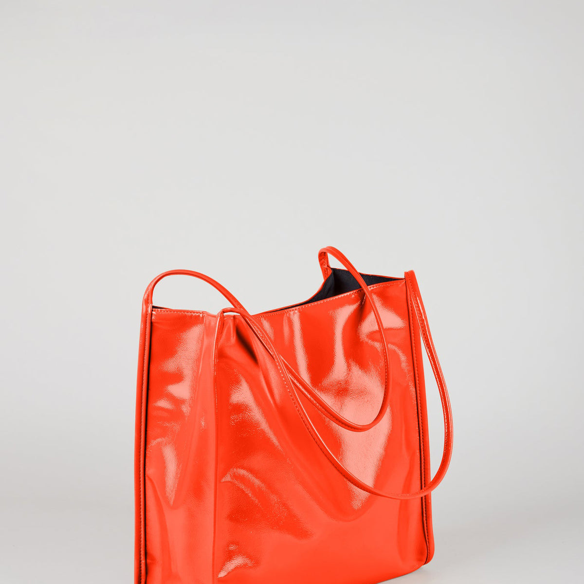 Orange high shine PVC tote bag | Glassworks London